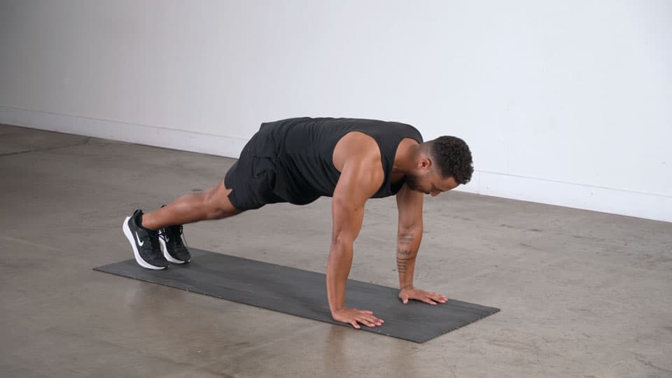 Plank with Shoulder Taps - JEFIT