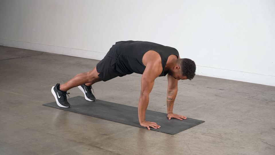 Plank with Shoulder Taps - JEFIT