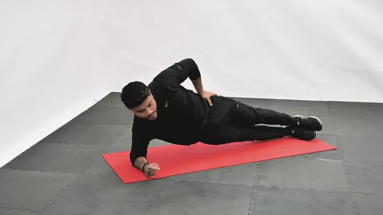 Plank with Shoulder Taps - JEFIT