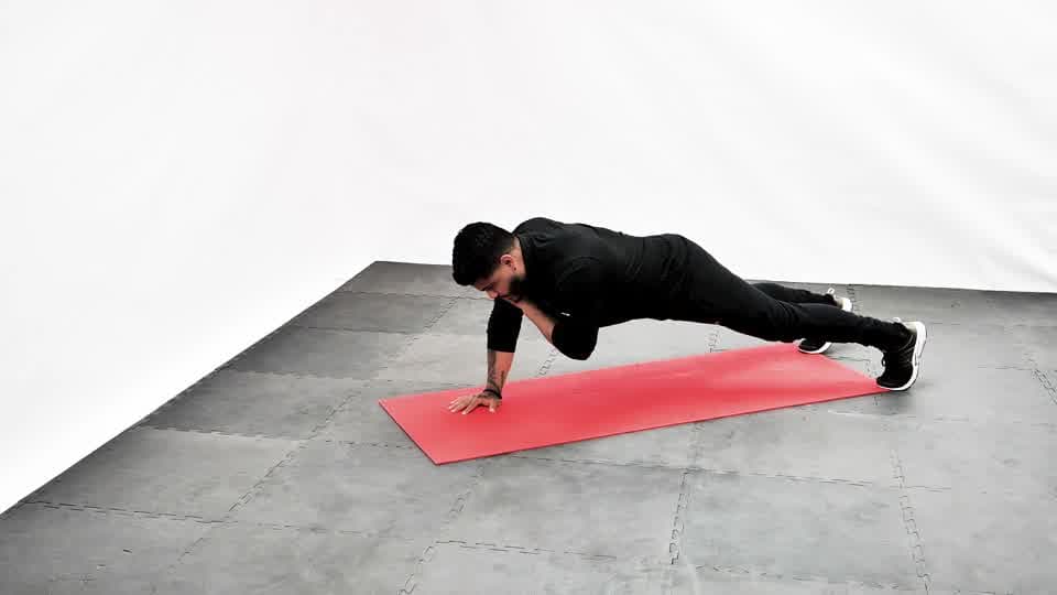 Plank with Shoulder Taps - JEFIT