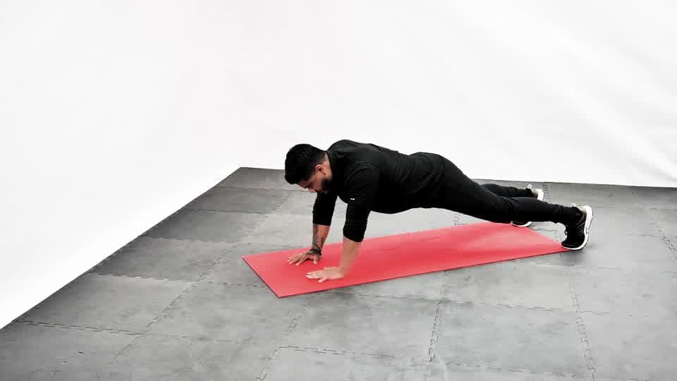 Plank with Shoulder Taps - JEFIT